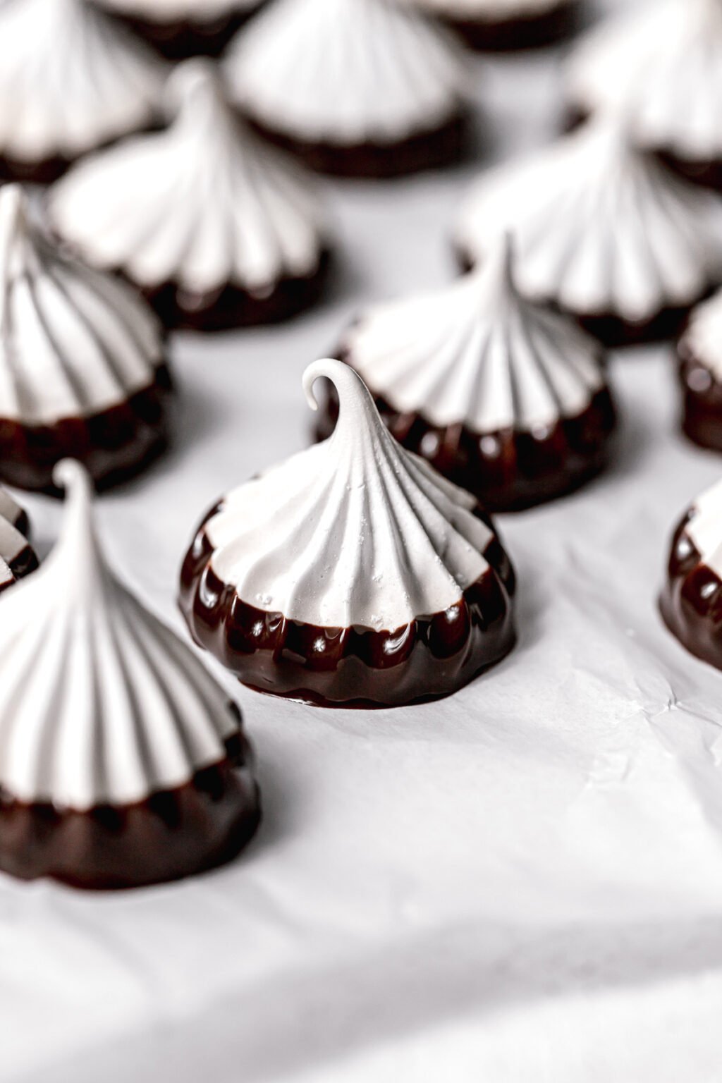 Chocolate Dipped Meringue Cookies - Sloane's Table